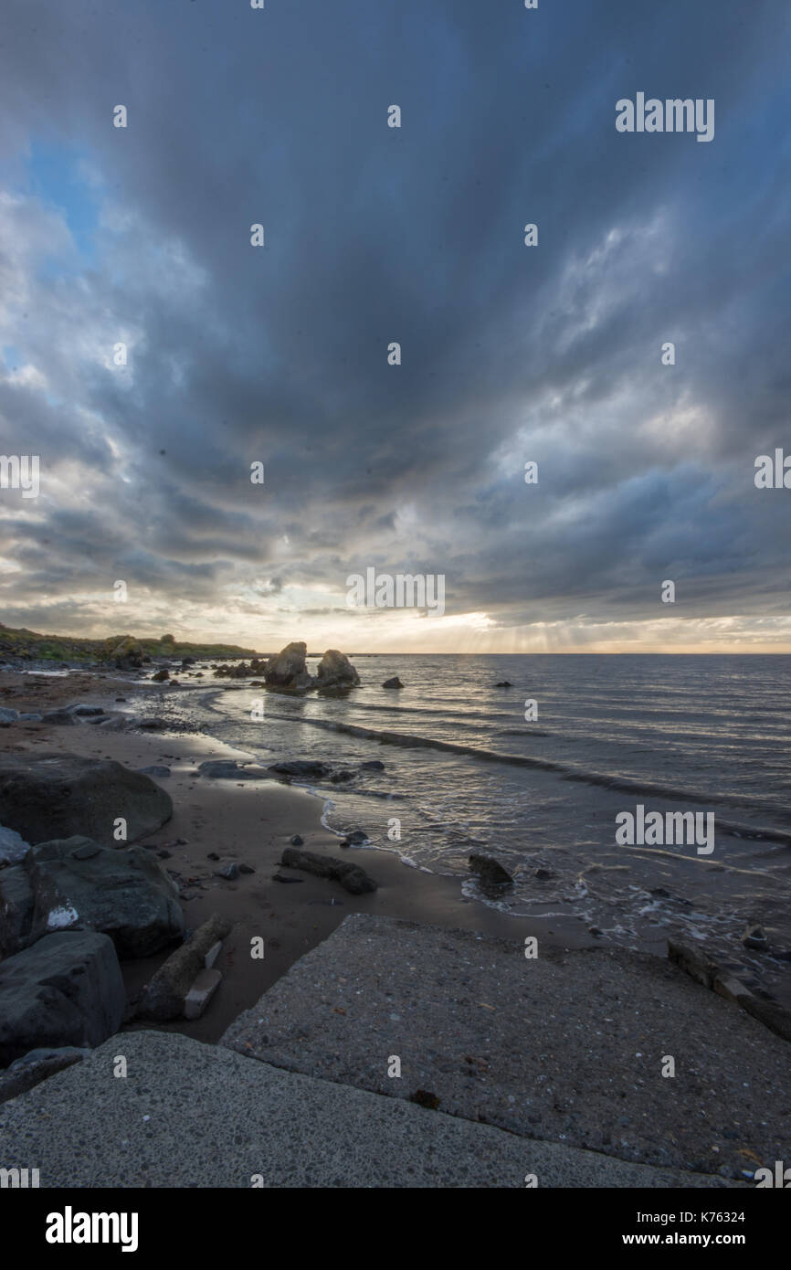 Sunset with red skies over the sea and beach from Lendalfoot near ...