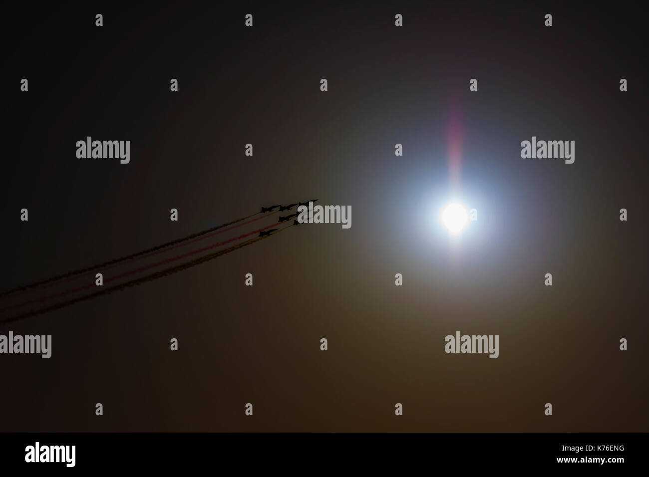 Turkish acrobatic aviation squadron flying over Izmir (Turkey). Backlit ...