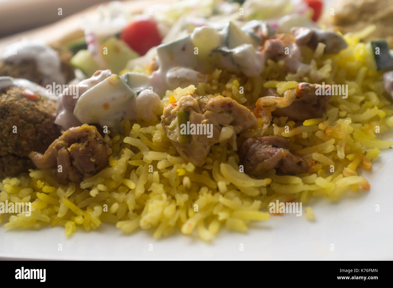 NYC street style Halal chicken and yellow rice with falafel and pita ...