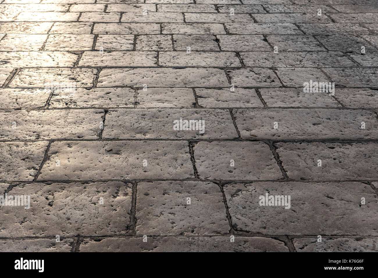 Stone paving texture. Abstract photo of stone city path Stock Photo - Alamy