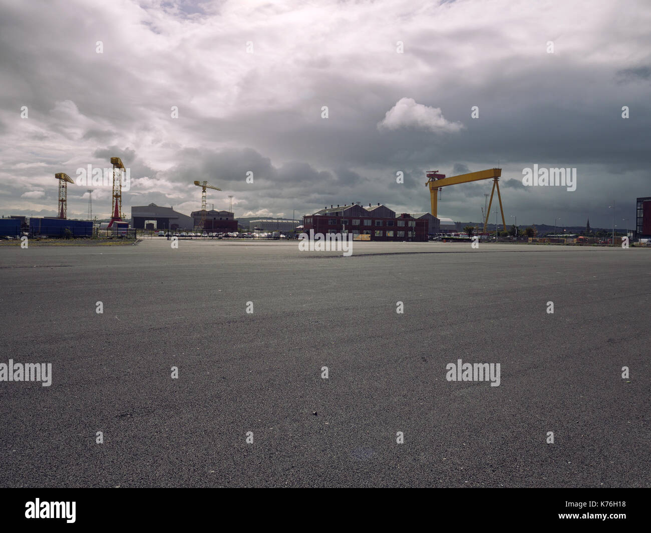Empty road surface against blur Belfast city landmark background Stock ...