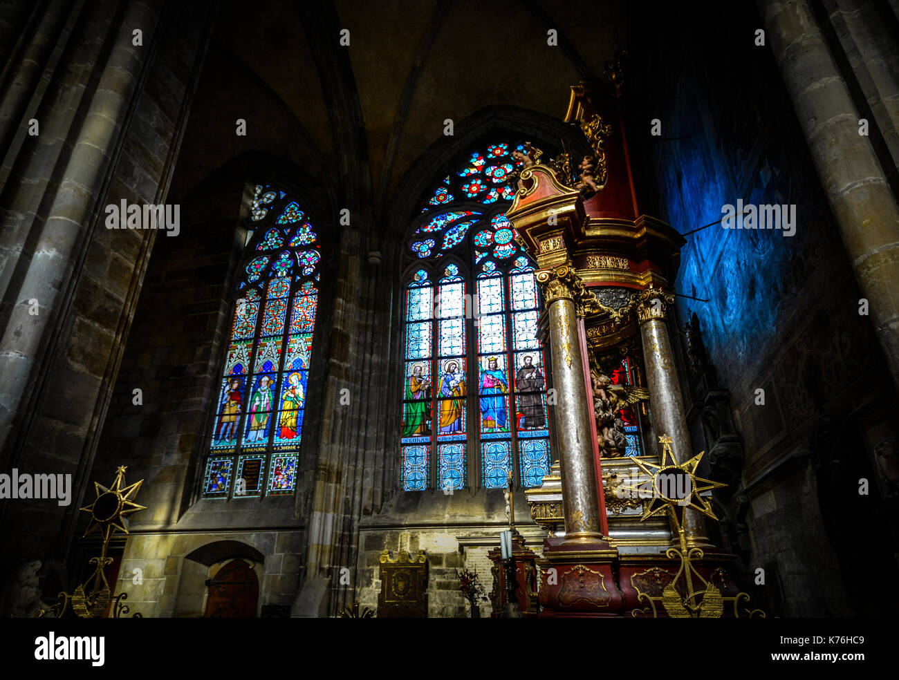 A colorful stained glass window inside St Vitus Cathedral in Prague ...