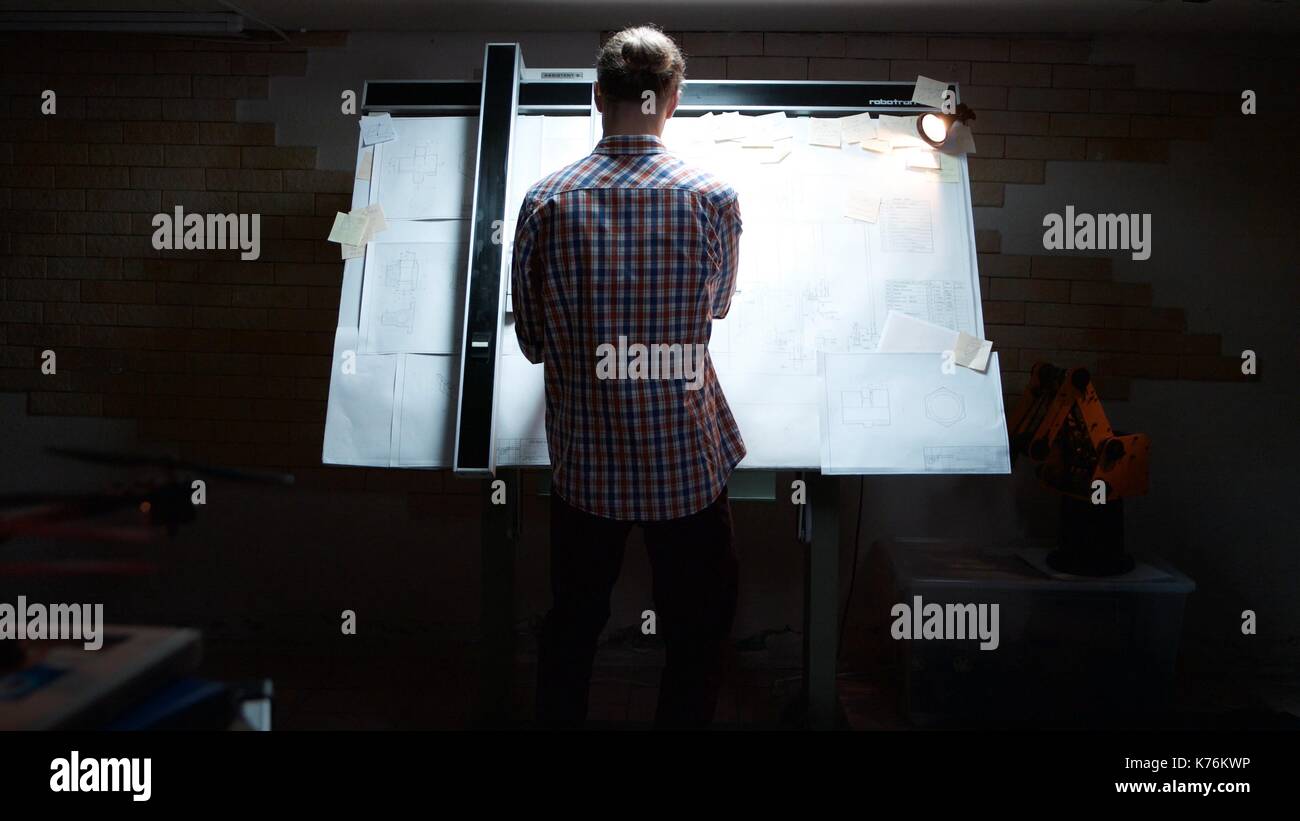 Rear view male constructor hi-res stock photography and images - Alamy