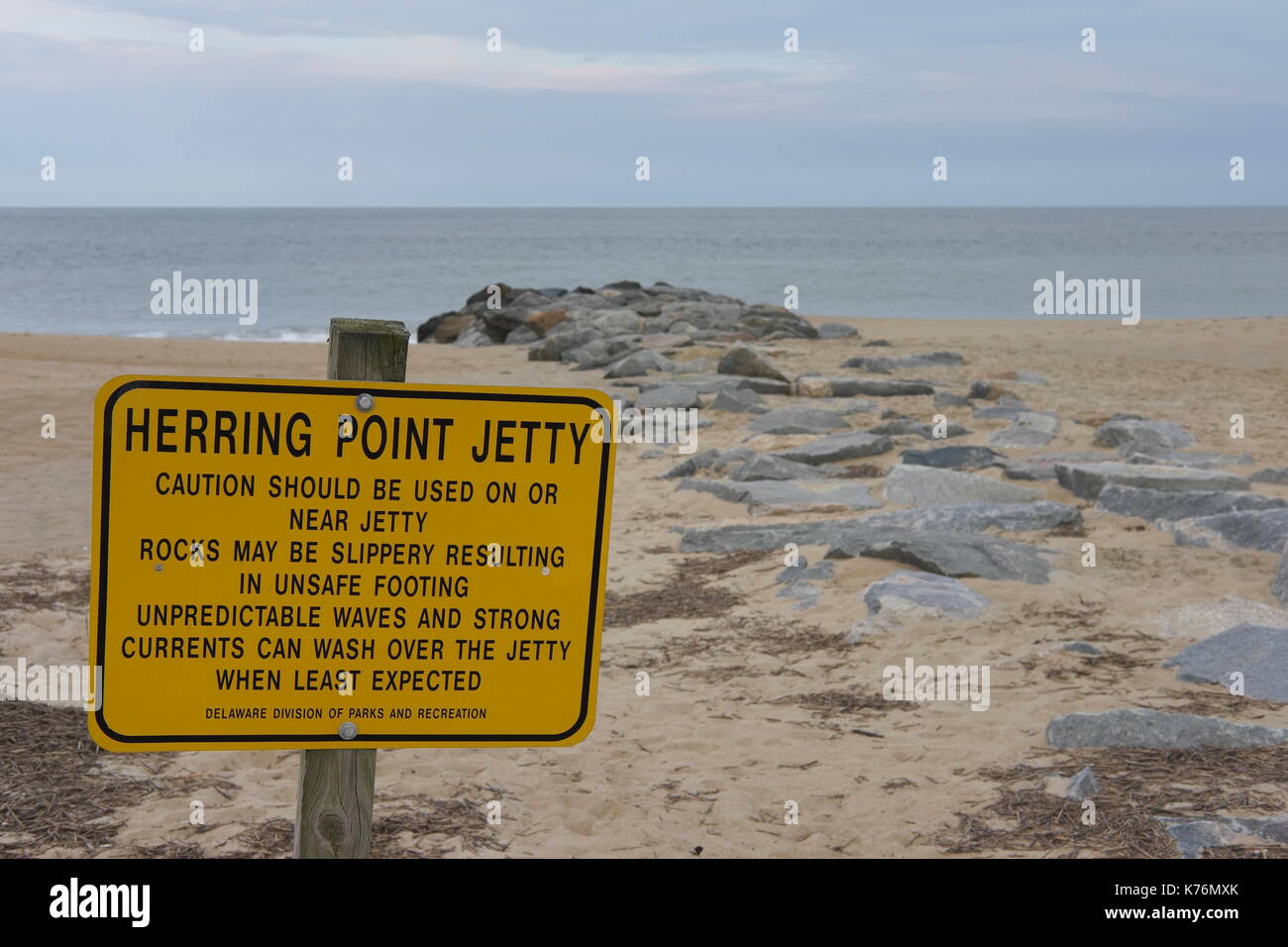 Herring Point Jetty safety signage warns of hazardous rocks and ...