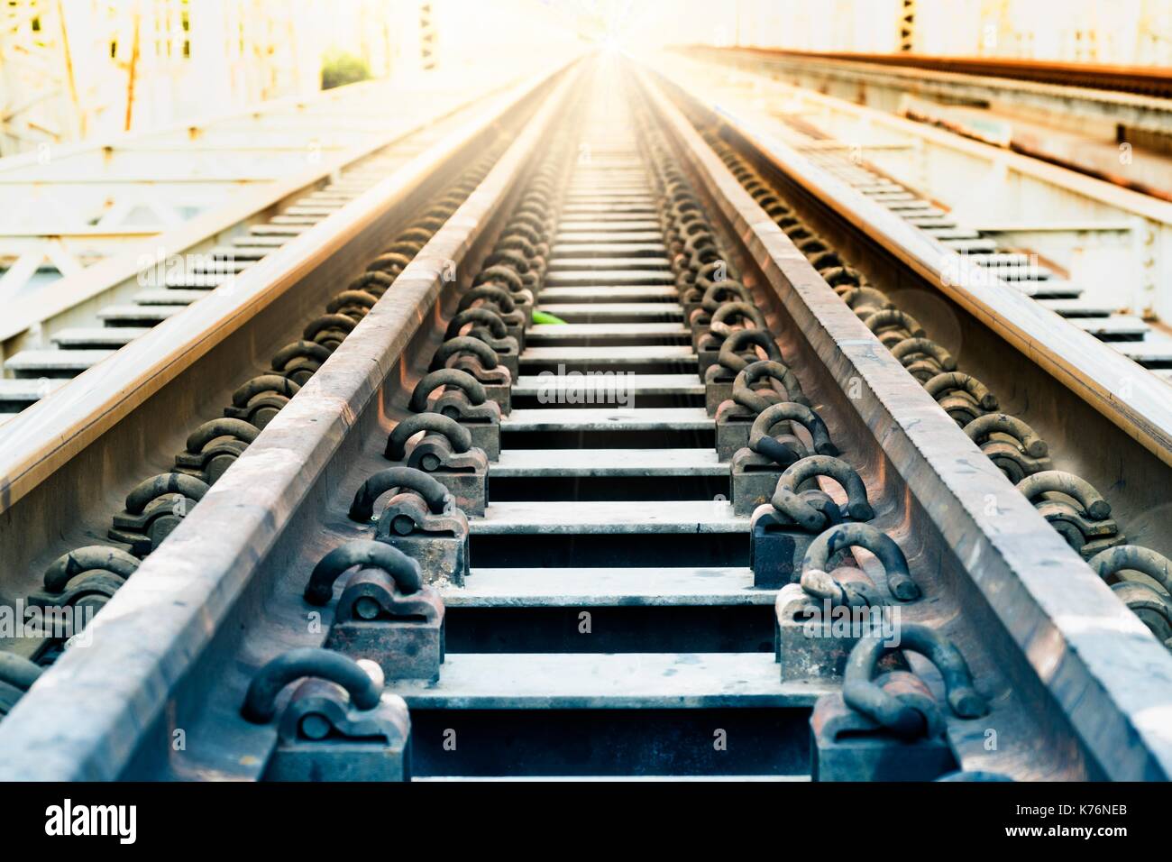 old iron white bridge and railway line Stock Photo - Alamy