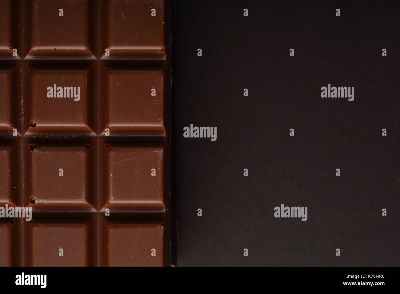 Dark background with chocolate, food Stock Photo - Alamy