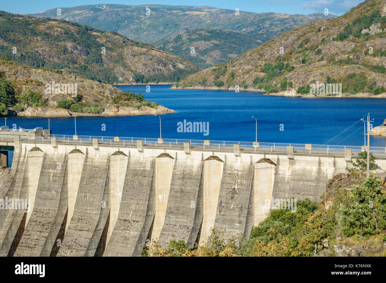 dam with blue bright water Stock Photo - Alamy