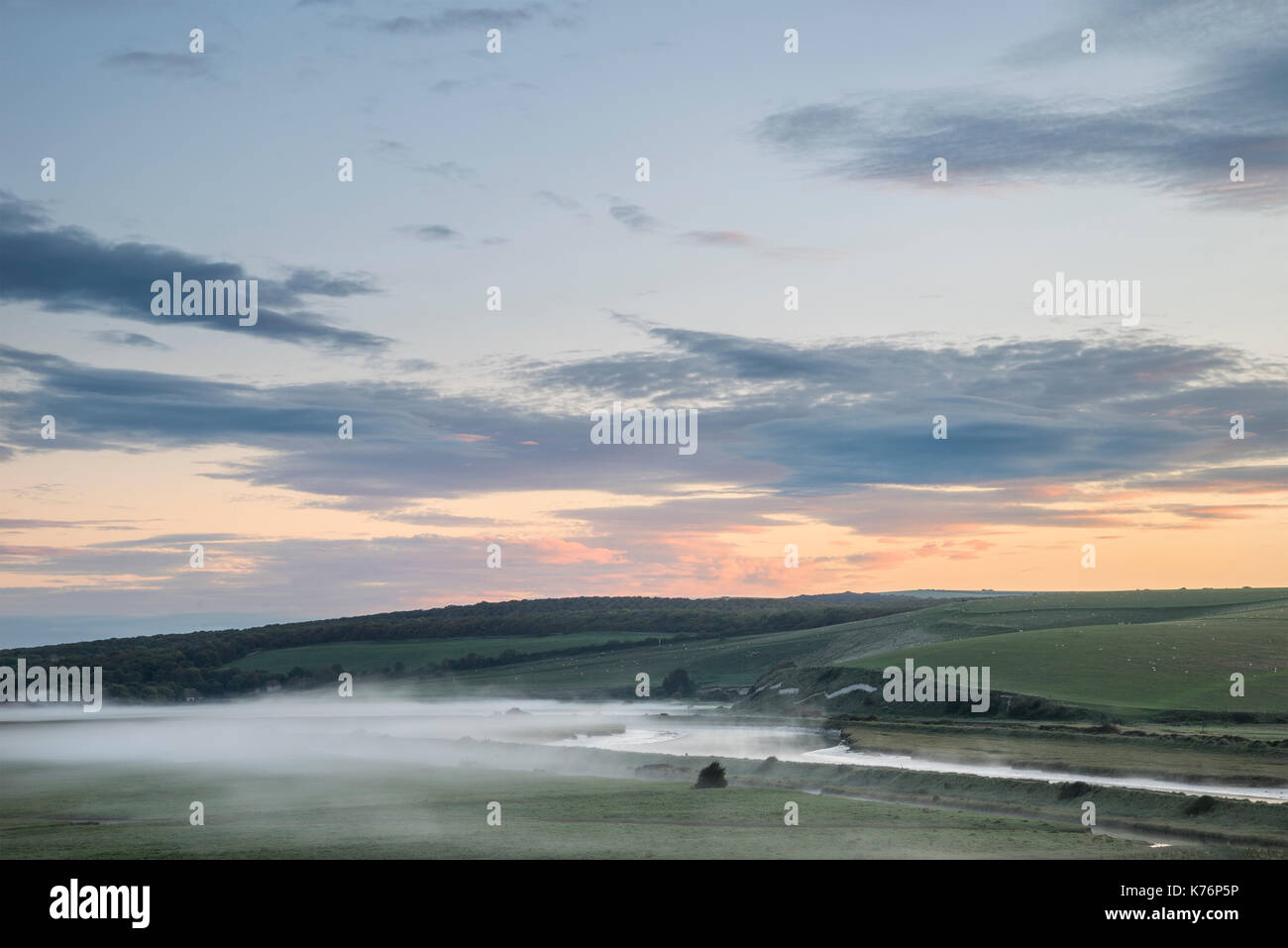Beautiful sunrise landscape over English countryside with river slowly ...