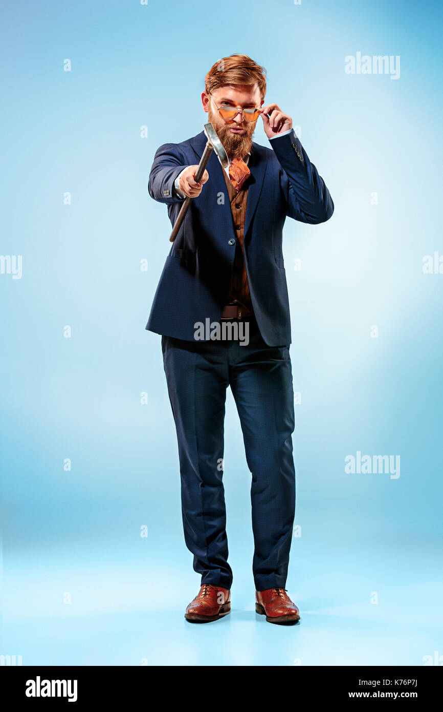 The barded man in a suit holding cane Stock Photo - Alamy