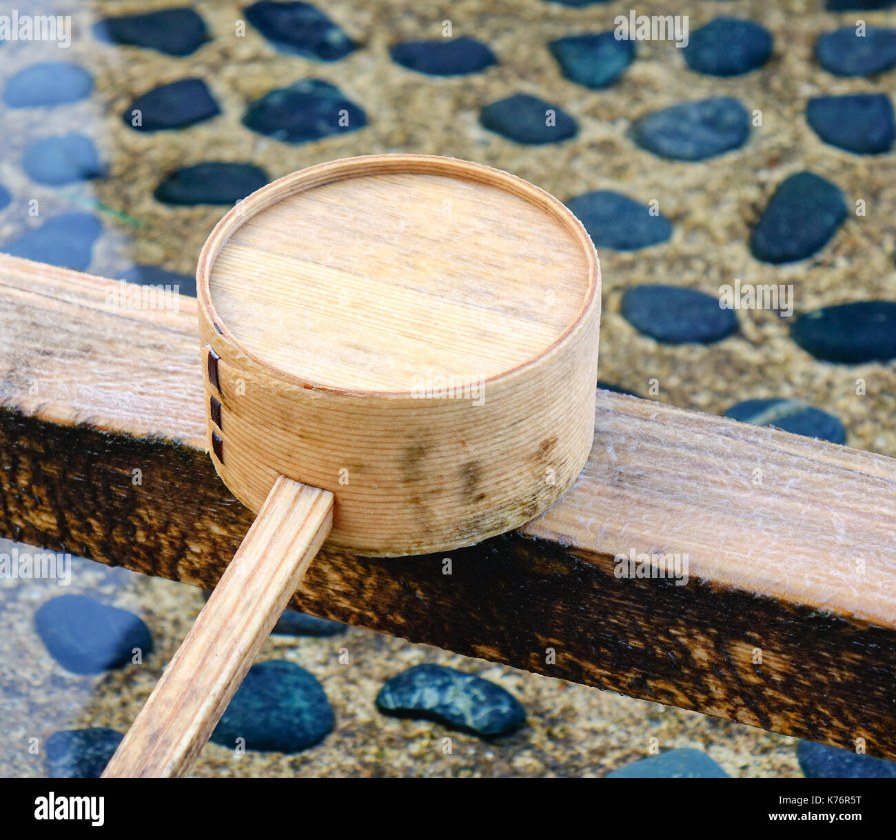 A Japanese wooden ladle at Shinto temple in Kyoto, Japan. In Japan, a ...
