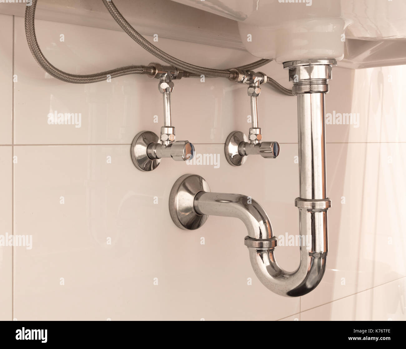 Basin siphon or sink drain in a bathroom, clean Stock Photo - Alamy
