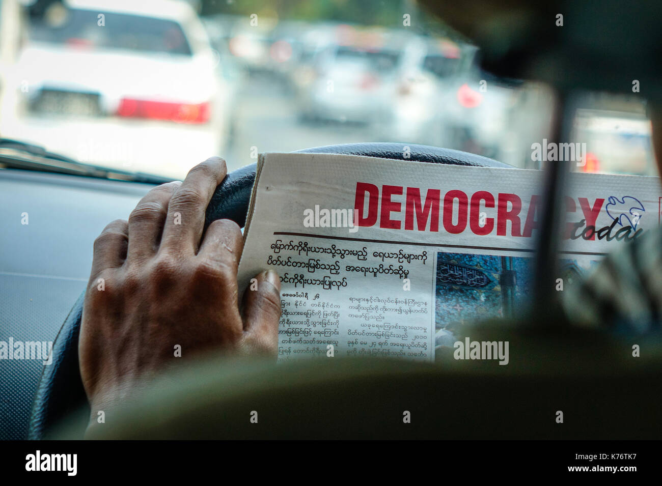 Newspaper man reading myanmar hi-res stock photography and images - Alamy