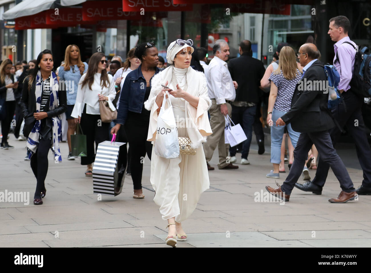 Britain’s inflation rate has held steady at 2.6% in July. Tourists and ...