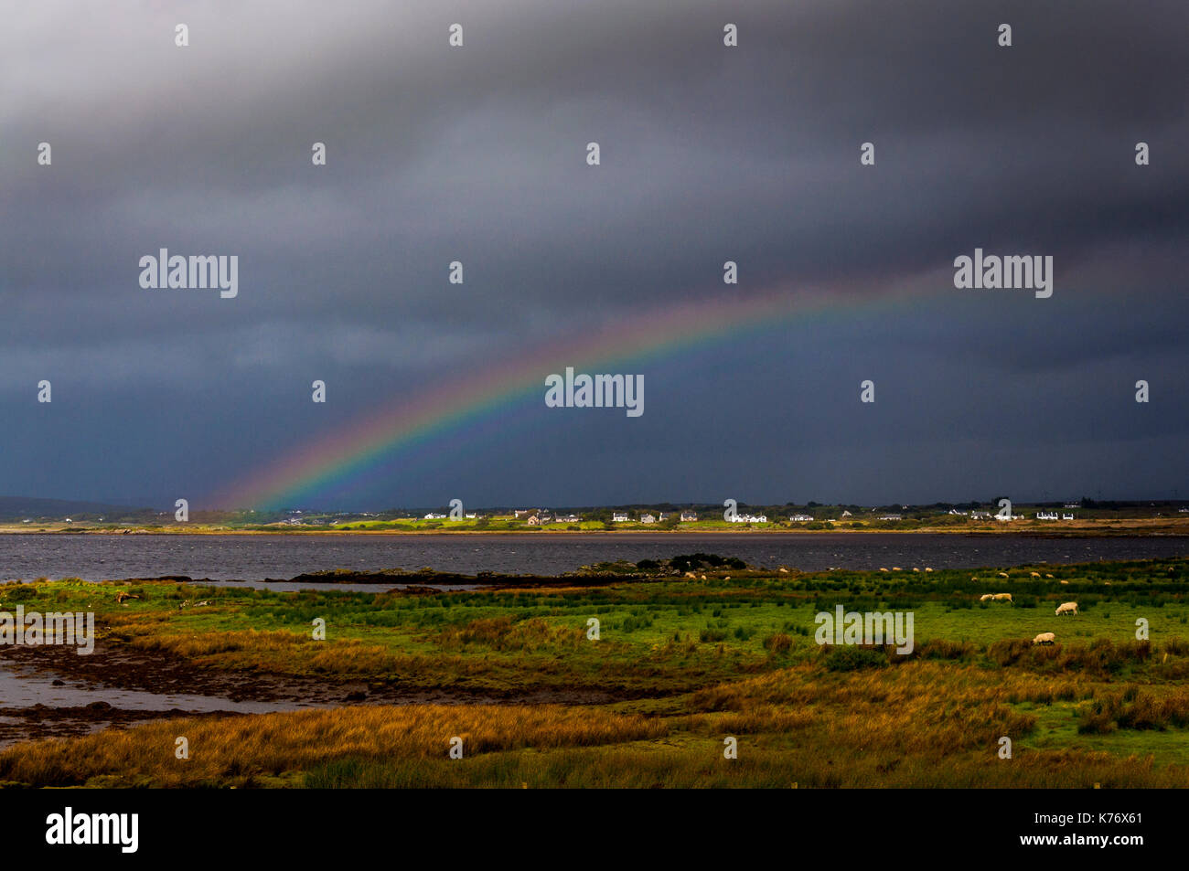 Ardara, County Donegal, Ireland A rainbow appears over the coastal town ...