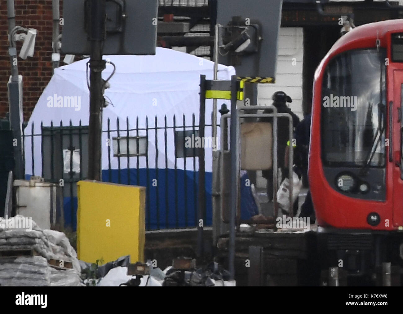 A forensic tent on the platform at Parsons Green station in west London ...