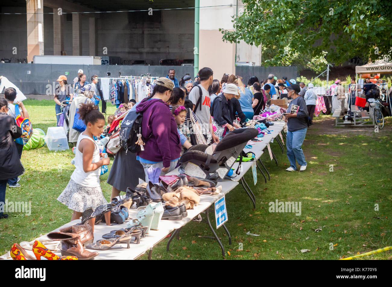 Thrifty shoppers at a free Stop 'N" Swap event in Riverside Park in New ...