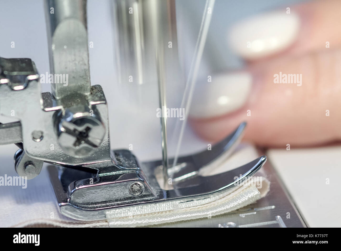 sewing machine and the needle Stock Photo - Alamy