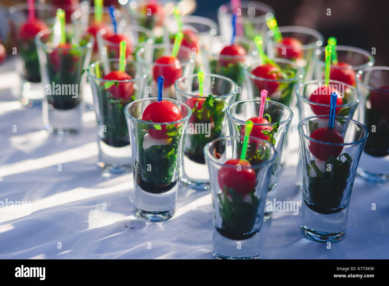 Beautifully decorated catering banquet table with different food snacks ...