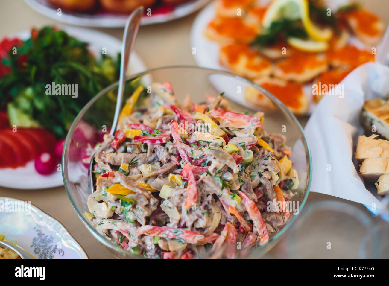 Beautifully decorated catering banquet table with different food snacks ...