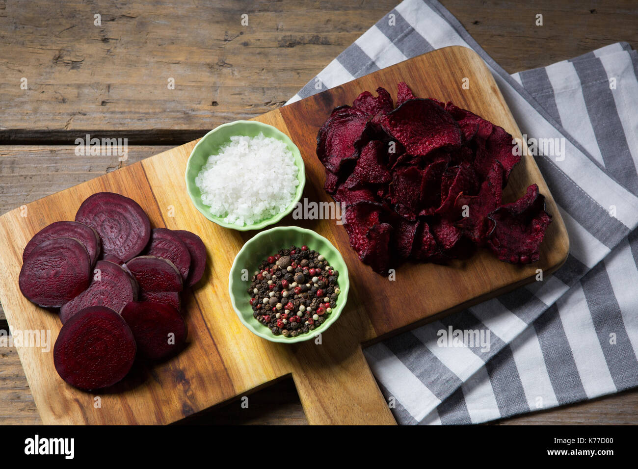 Overhead of beetroot slice with black pepper and salt in bowl Stock ...