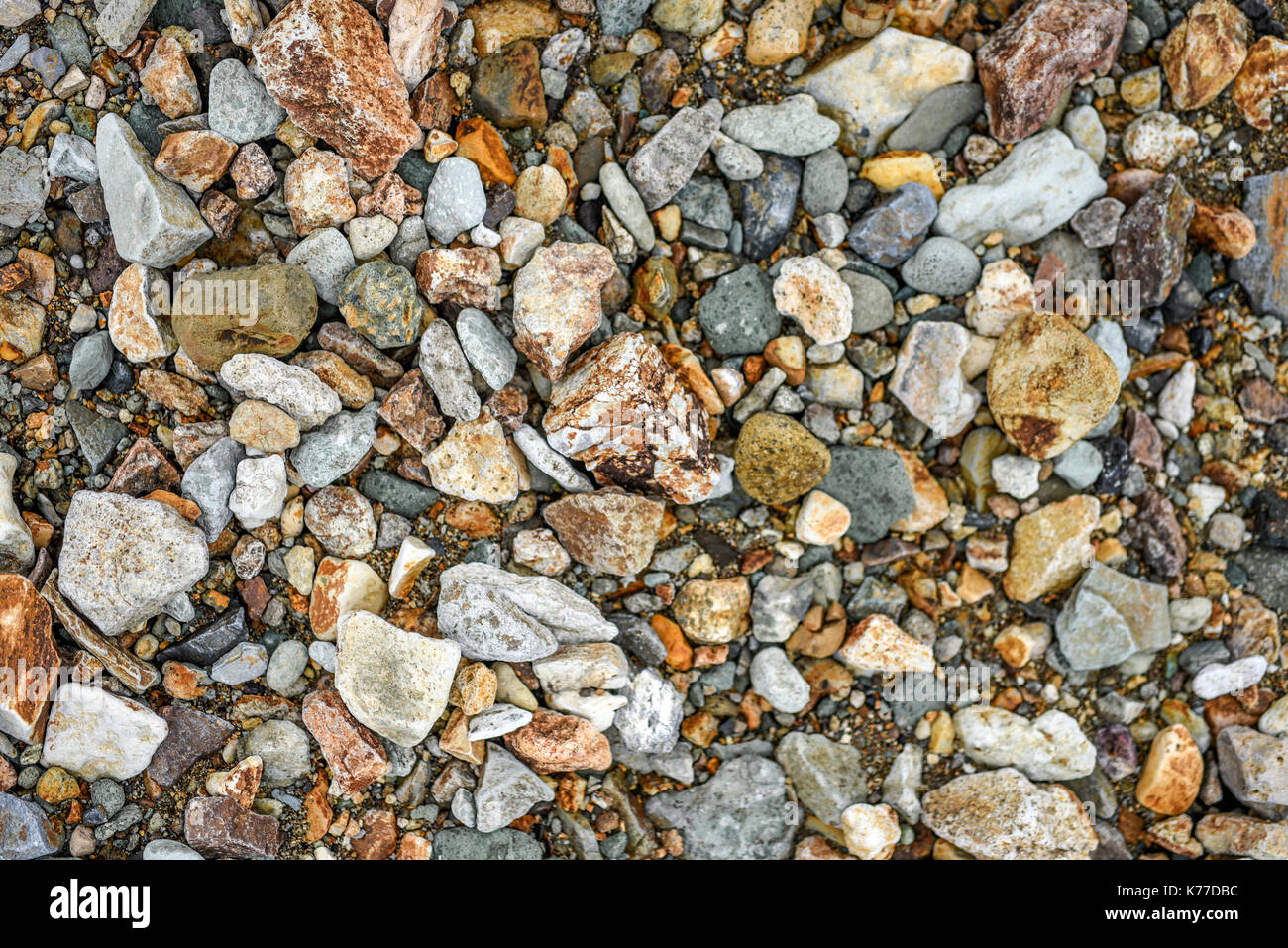 Texture of different sizes of colored stones, Iceland Stock Photo - Alamy
