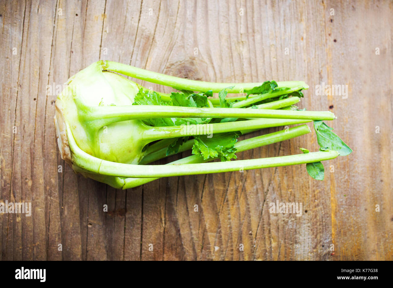 Kohlrabi a healthy green vegetable on a rustic board Stock Photo - Alamy