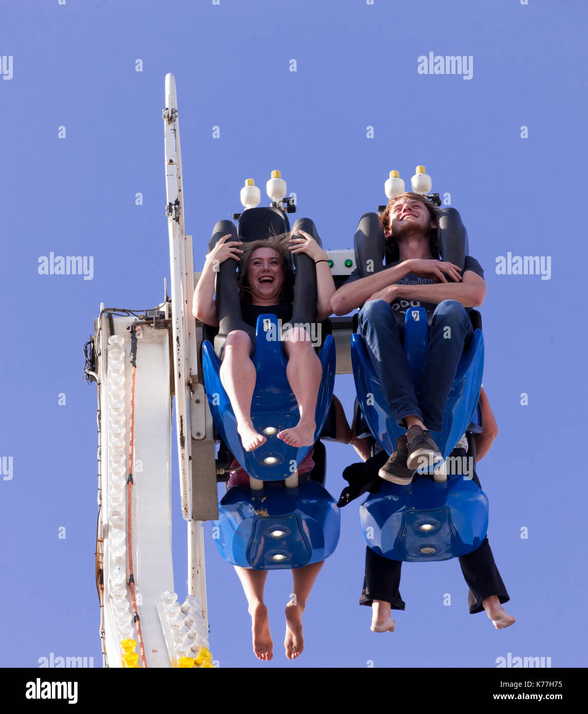 Landscape and portrait images of the midway, rides and games at an ...