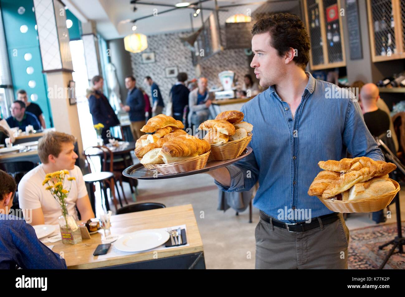 France, Marne, Reims, barman with lots of french croissant Stock Photo ...