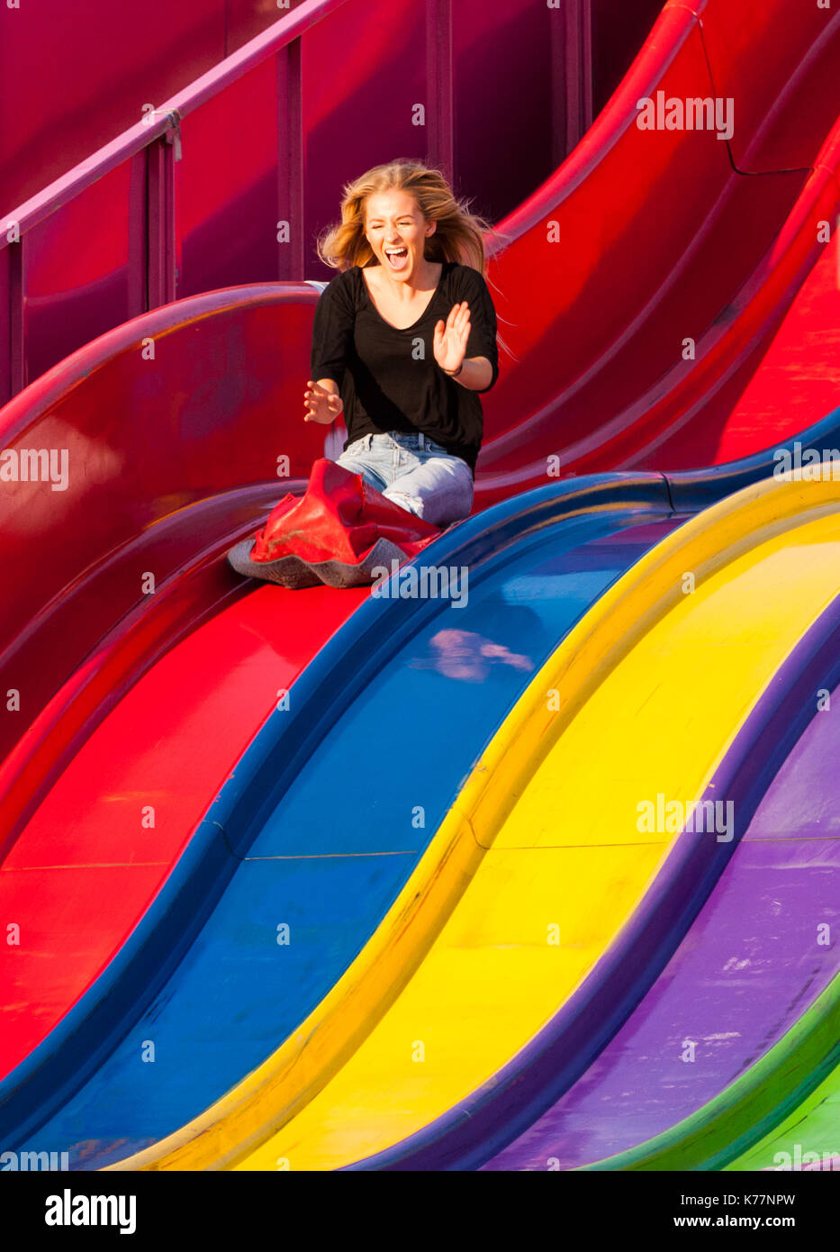 Landscape and portrait images of the midway, rides and games at an ...