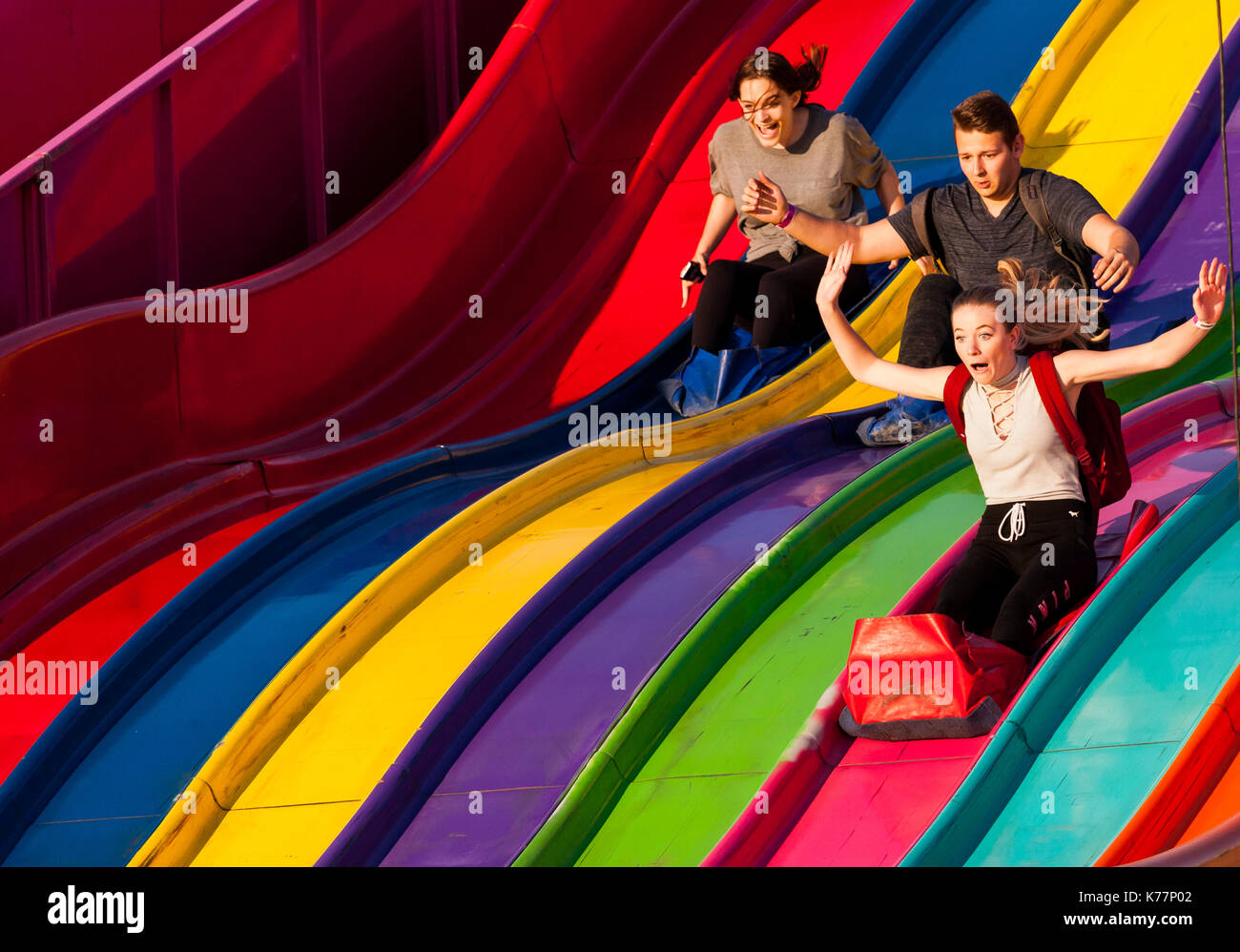 Landscape and portrait images of the midway, rides and games at an ...