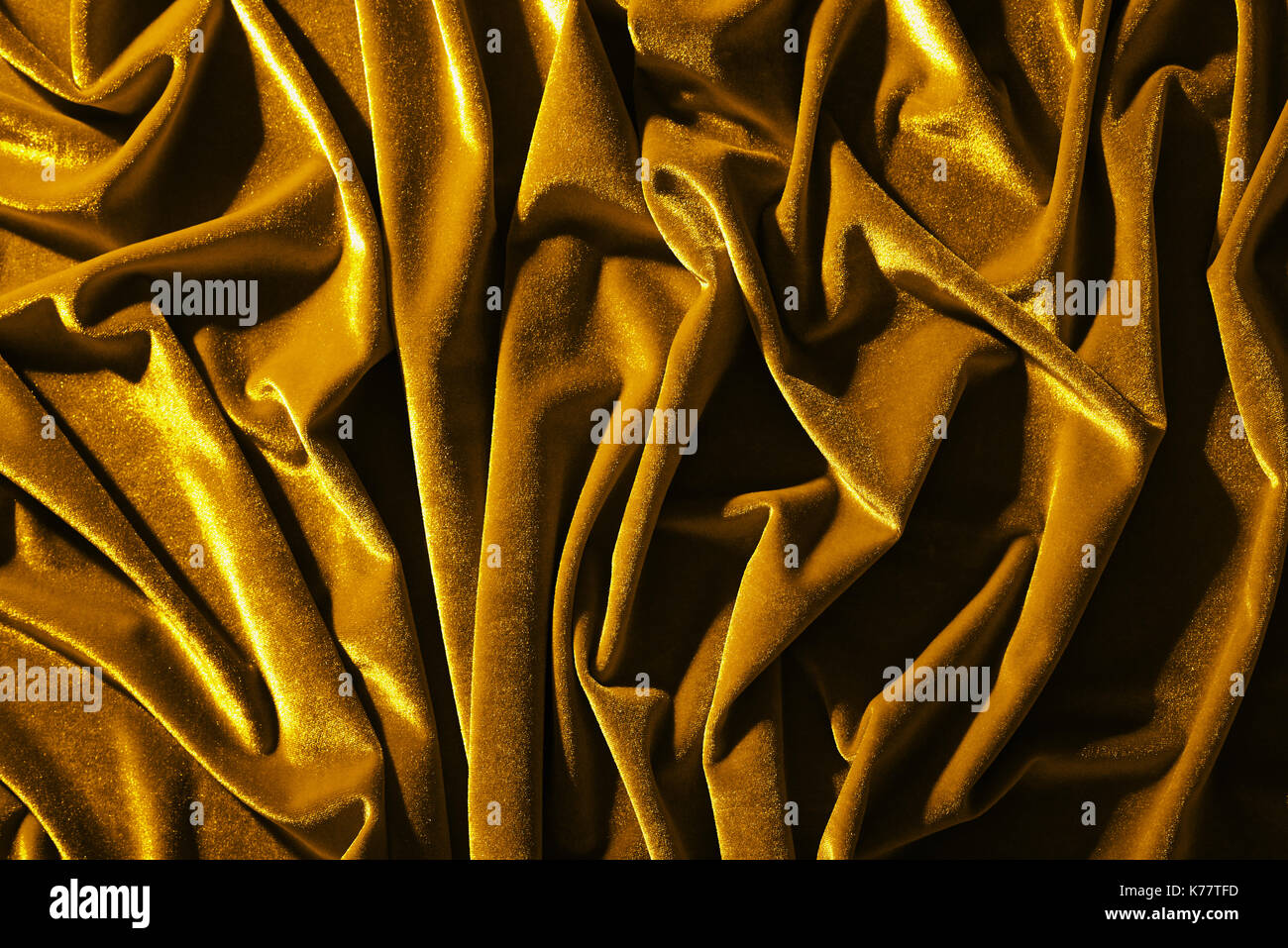 golden velvet textile for background or texture Stock Photo - Alamy