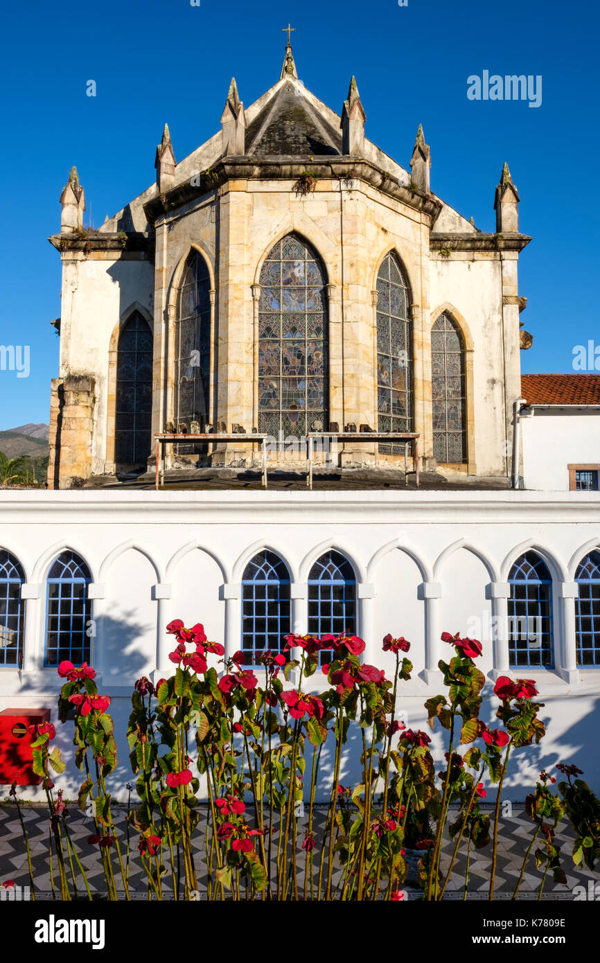 Back view of Caraca Sanctuary neo-gothic church windows at dawn ...
