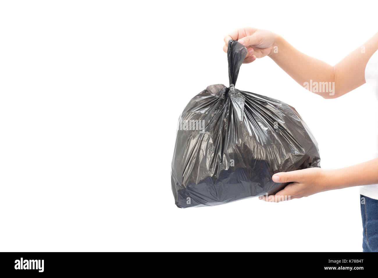 Female hands holding garbage bag isolated on white background Stock ...