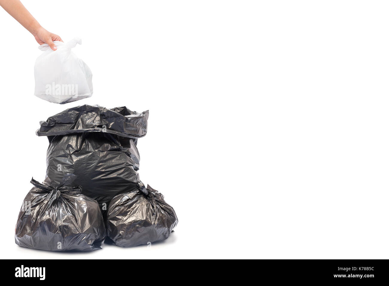 Female hands holding garbage bag isolated on white background Stock ...