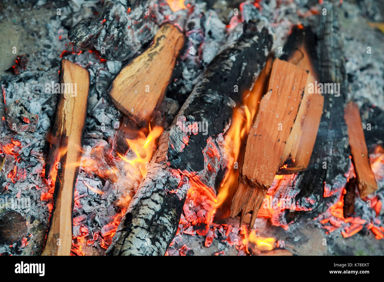 three burning billets in hot stove fire wood Stock Photo - Alamy