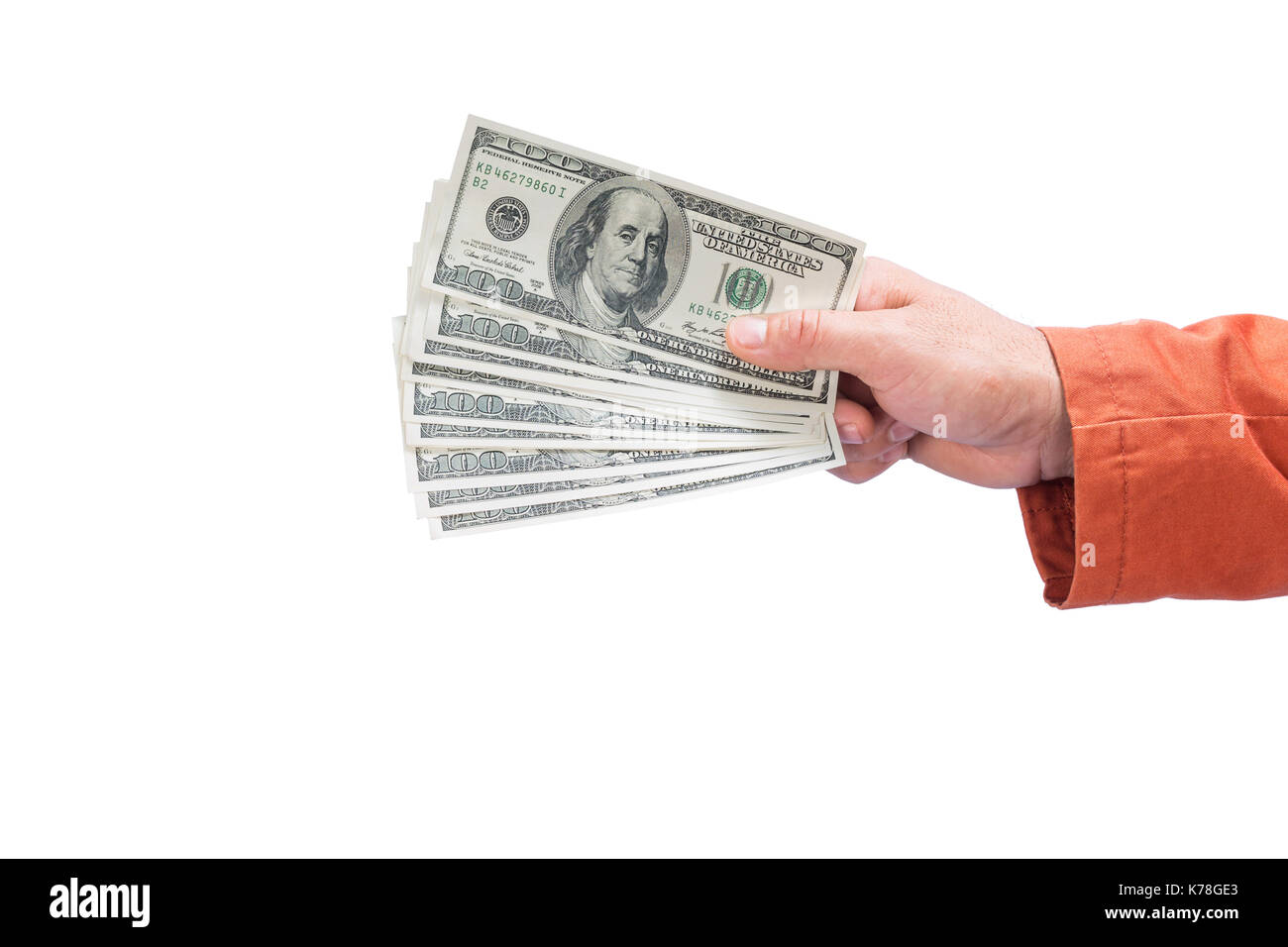 handful of money on hand isolated on white background Stock Photo - Alamy