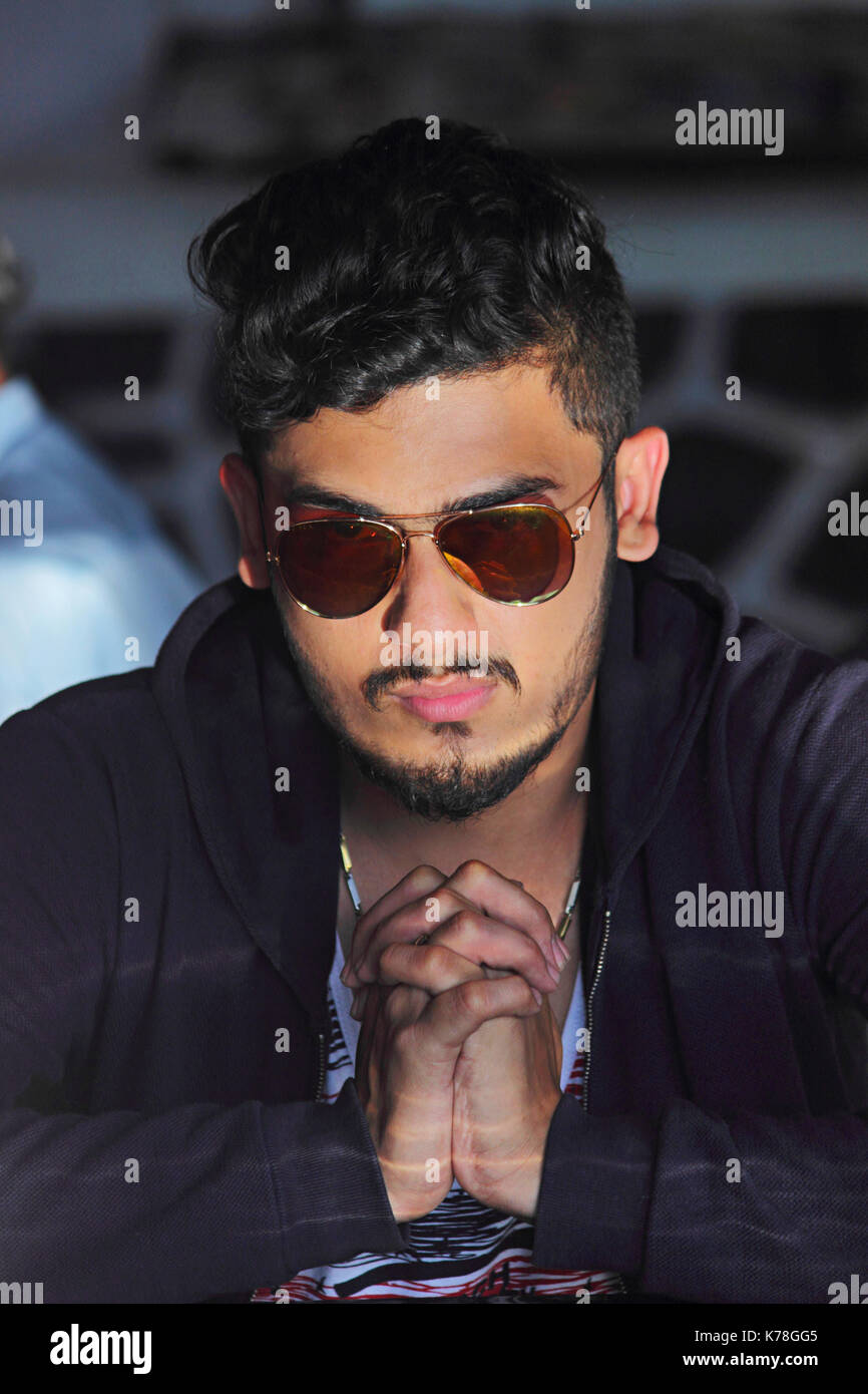 Young Indian man with goggles close-up Stock Photo - Alamy