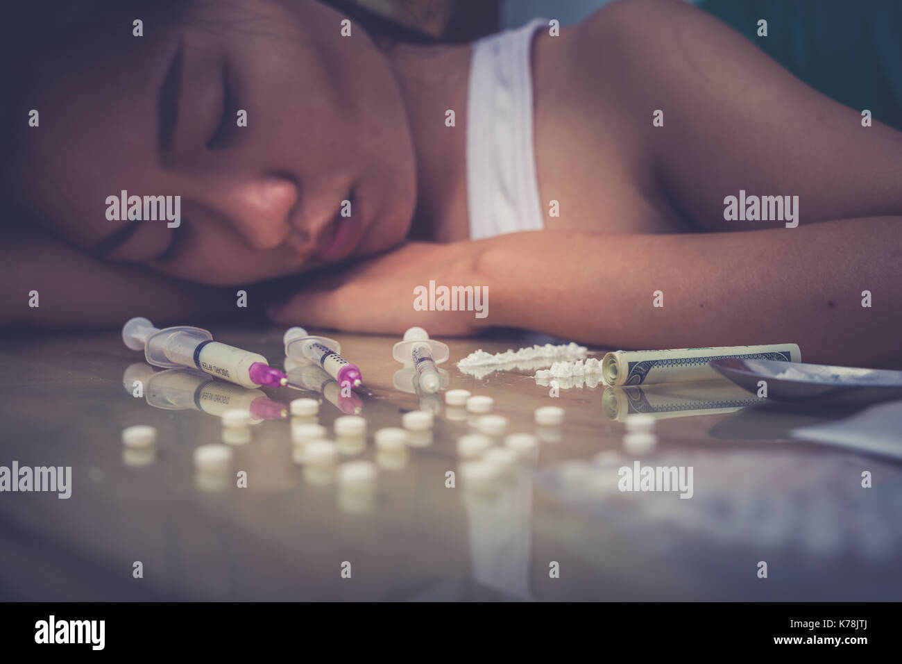 Drug addict young woman with syringe in action, Drug abuse concept ...