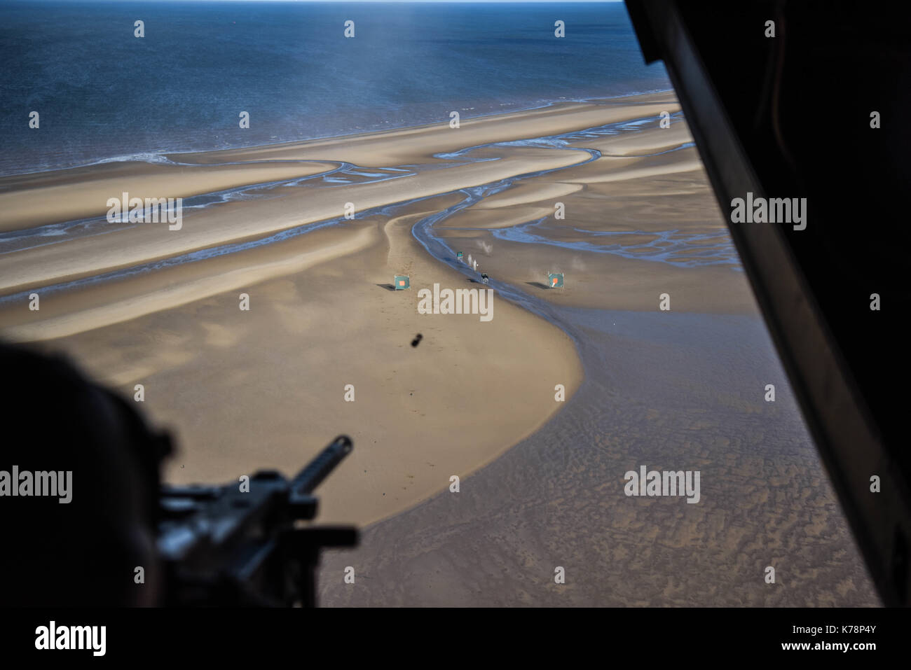 352d Special Operations Wing fires a .50 caliber machine gun aboard a ...