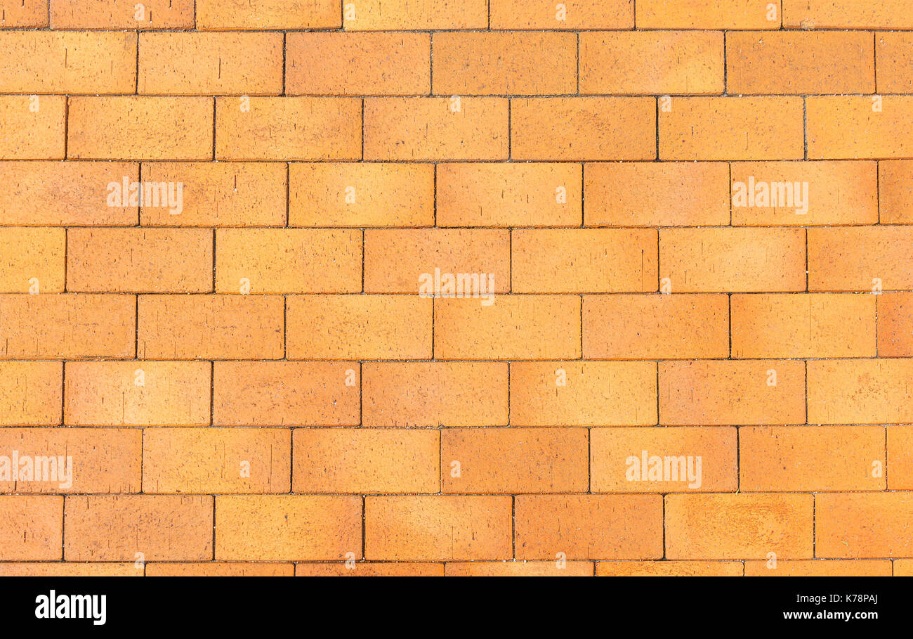 Background yellow brick walkway Stock Photo - Alamy