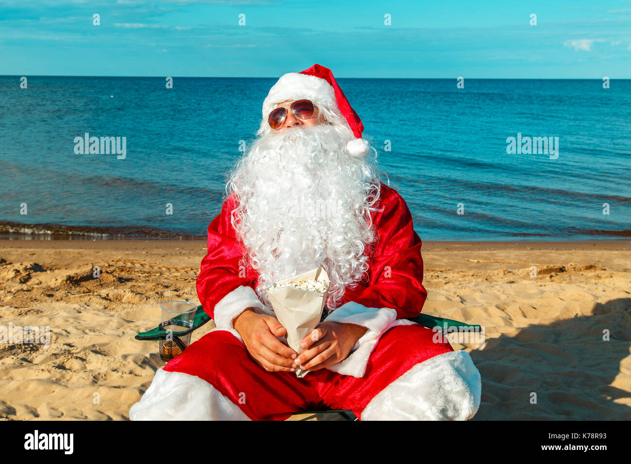 Beach man beer chair hi-res stock photography and images - Alamy