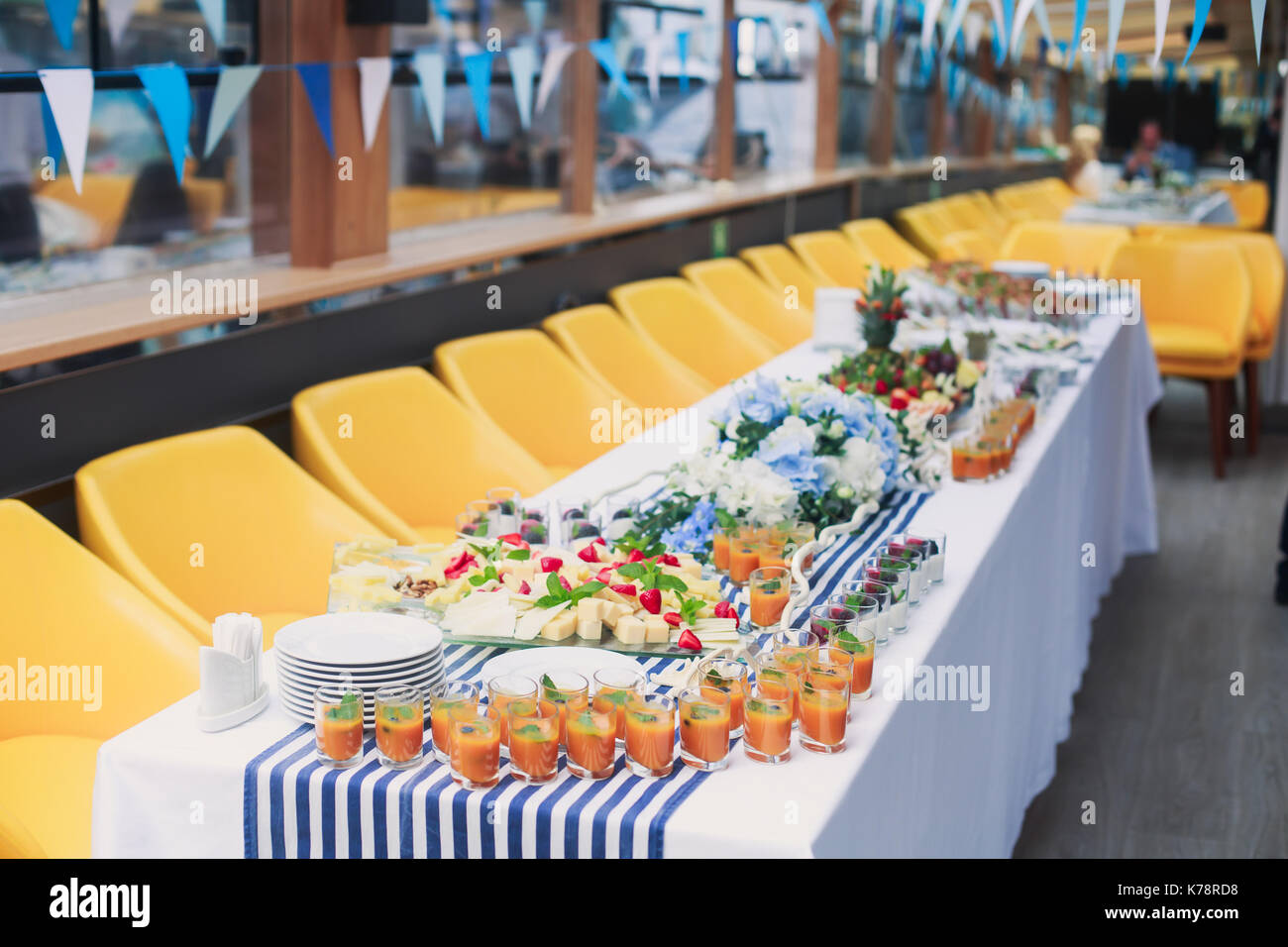 Beautifully decorated catering banquet table with different food snacks ...