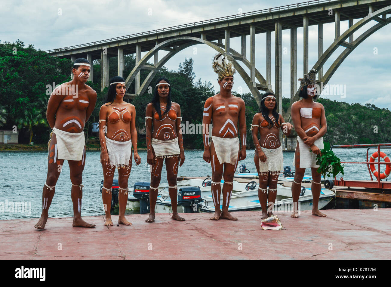 A Taino man and woman natives of Cuba perform a traditional healing ...