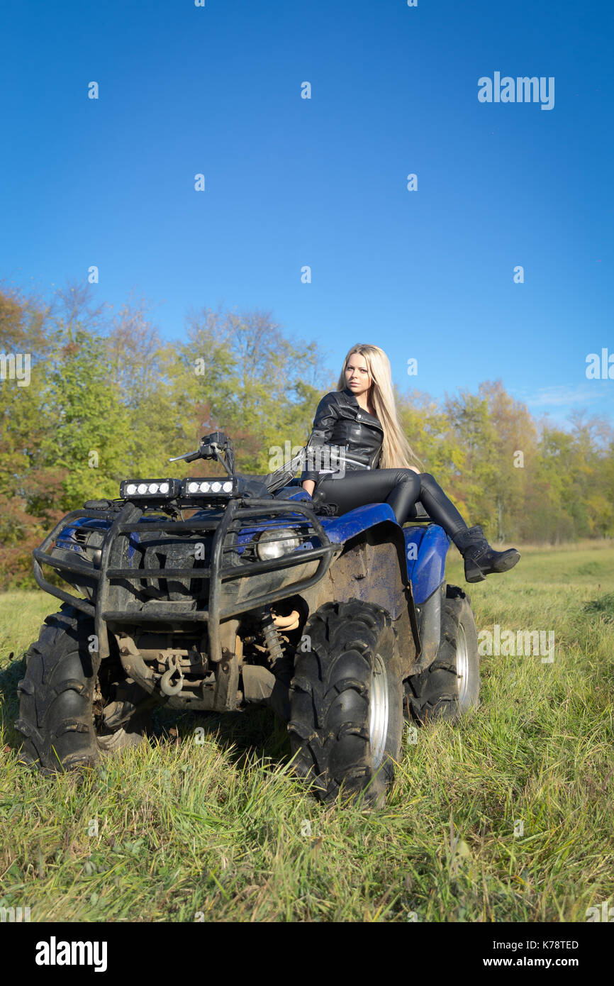 Riding the atv hi-res stock photography and images - Alamy