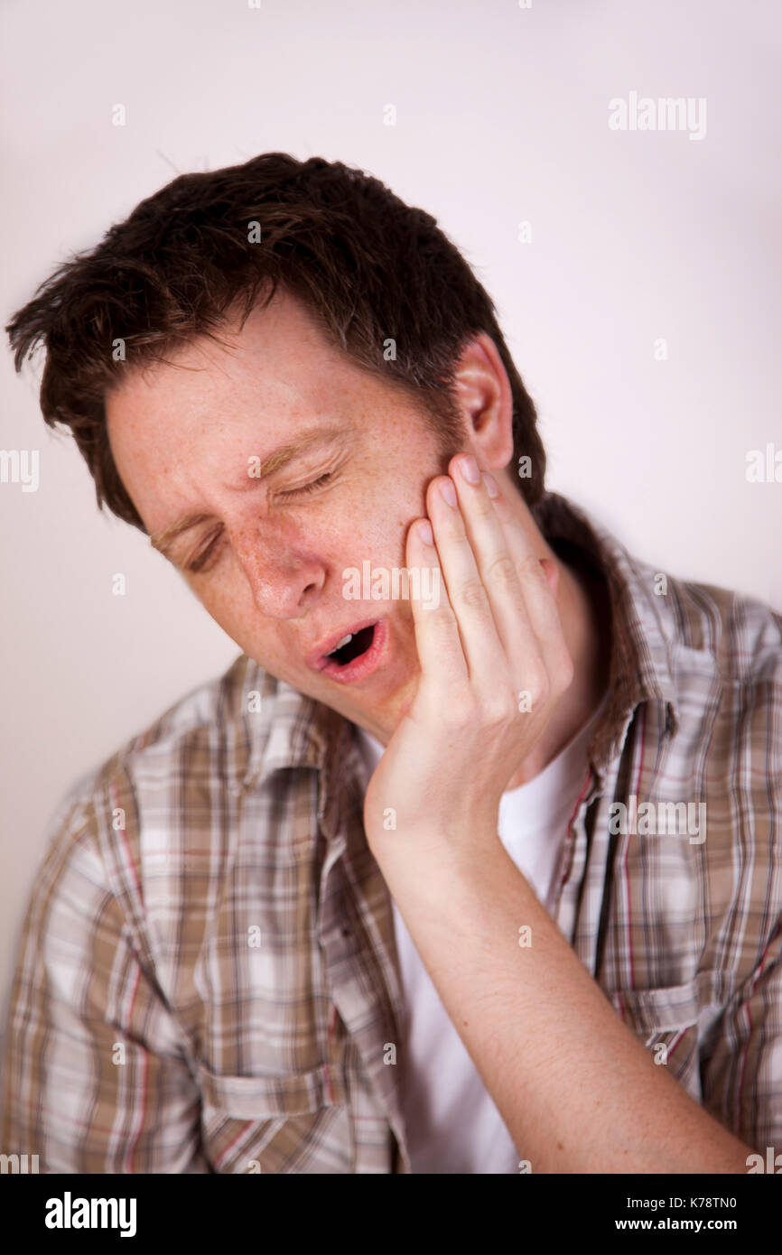 Wince pain hi-res stock photography and images - Alamy