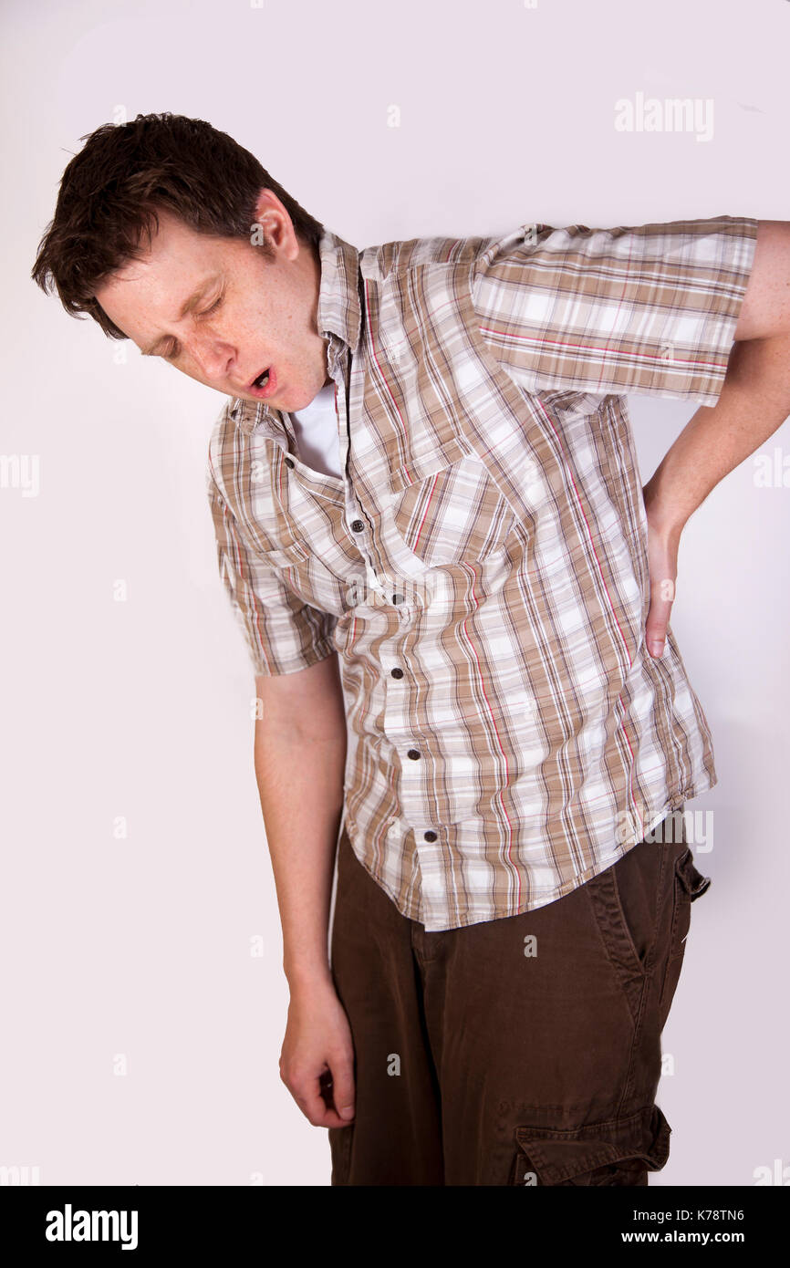 Hunched posture hi-res stock photography and images - Alamy