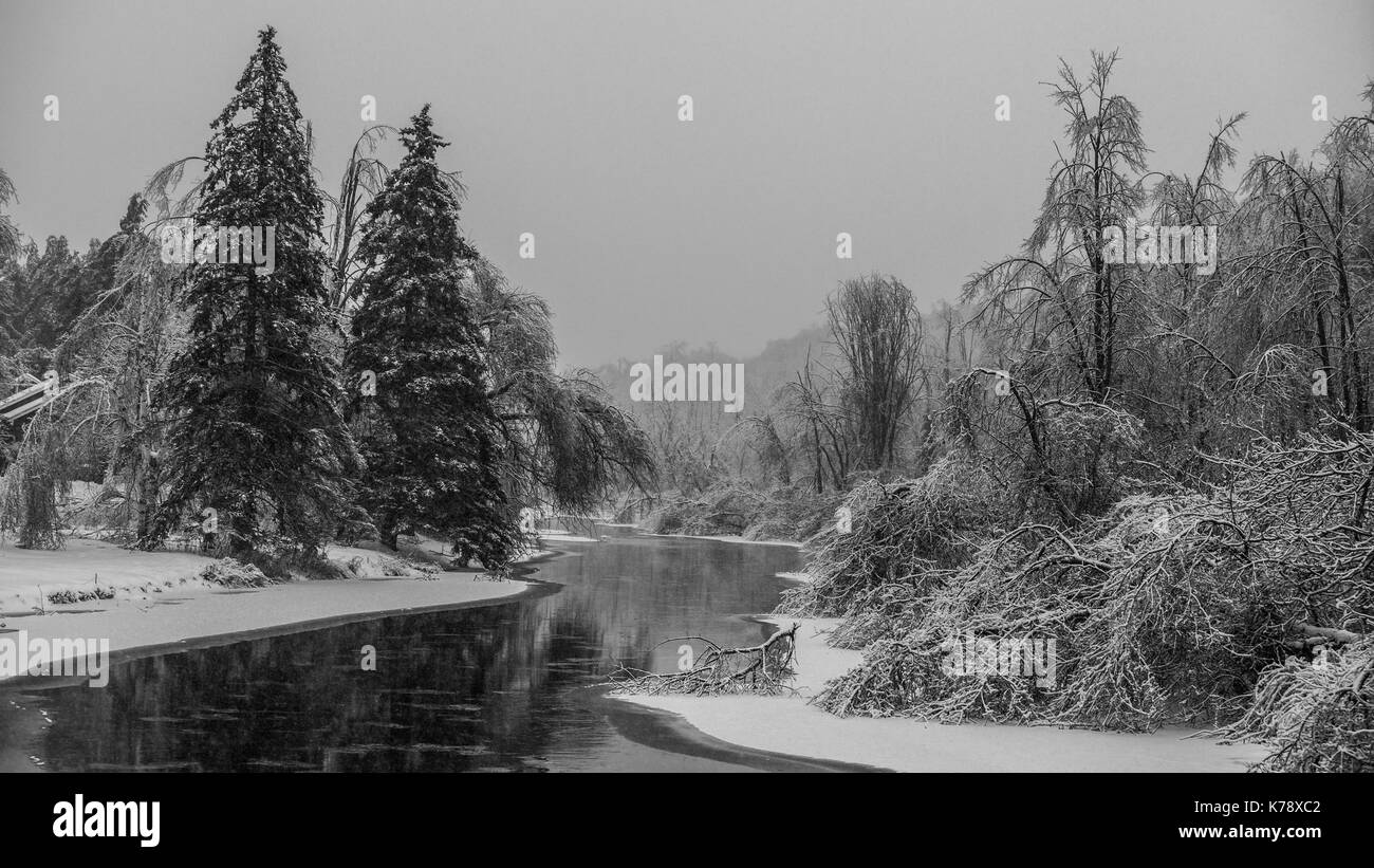 captured this river one afternoon during a gentle snowfall Stock Photo ...