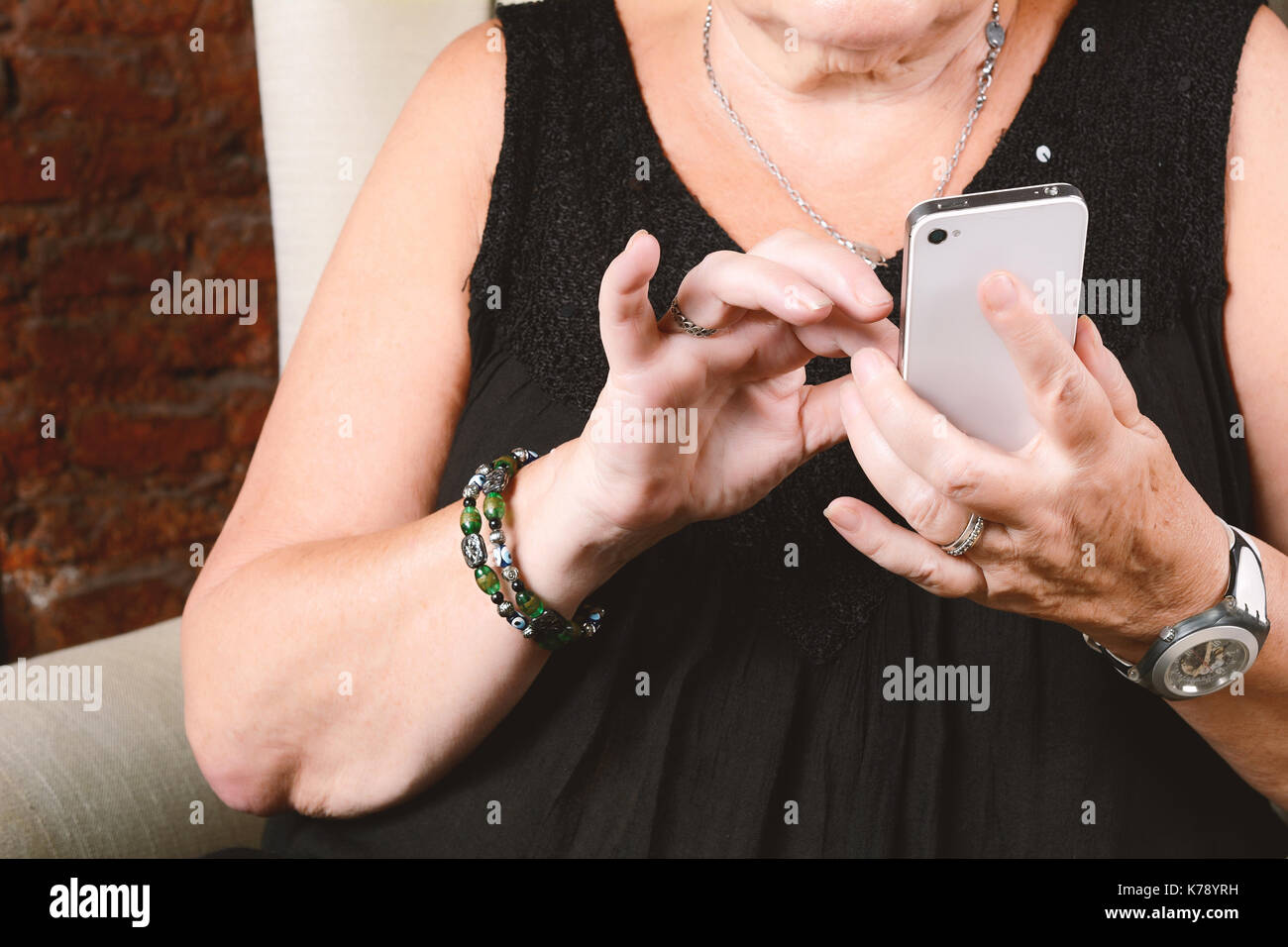 Woman typing messages on mobile hi-res stock photography and images - Alamy