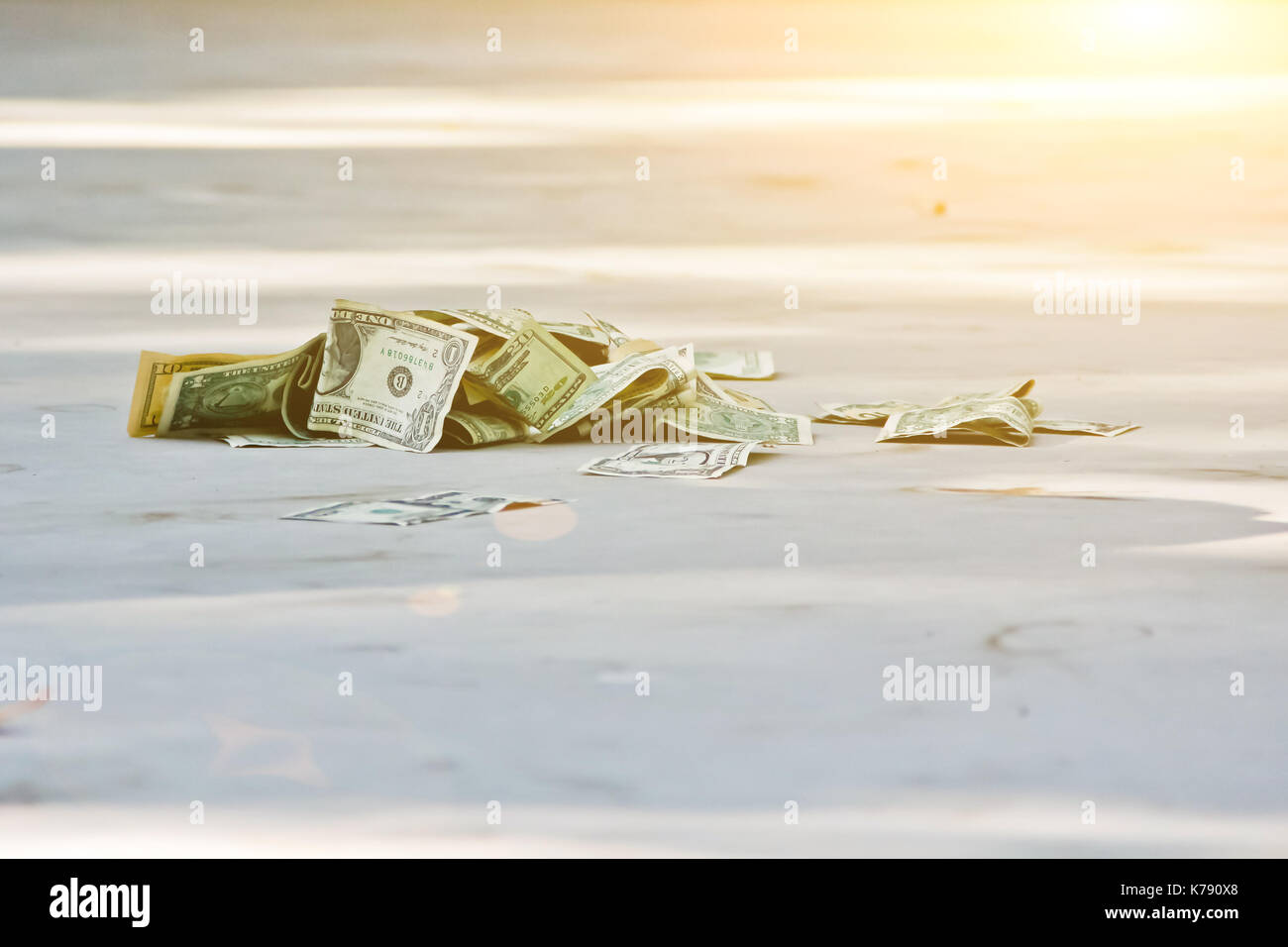 US Dollar Bills on the Ground Stock Photo - Alamy