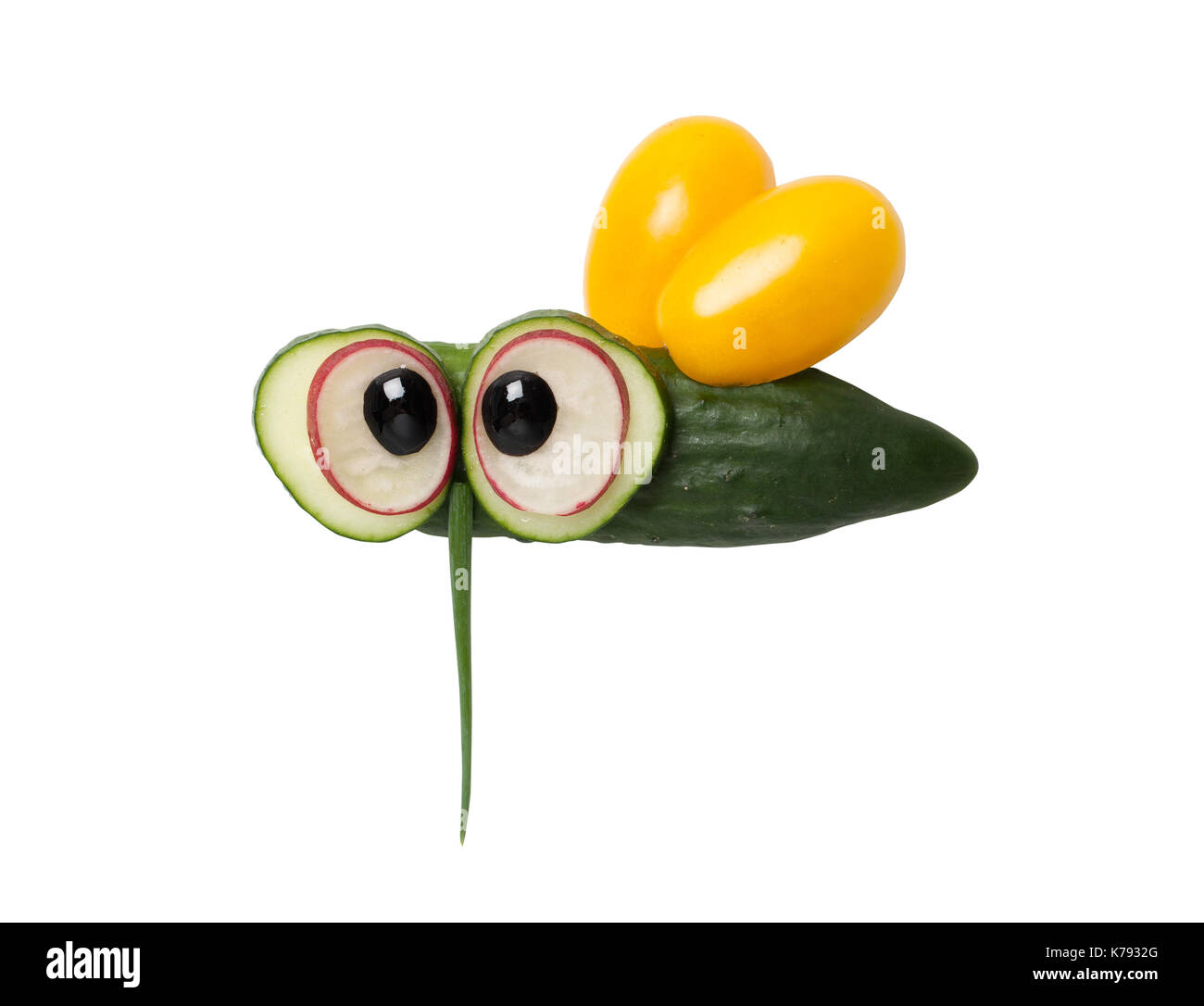 Fly made of cucumber on isolated background Stock Photo - Alamy